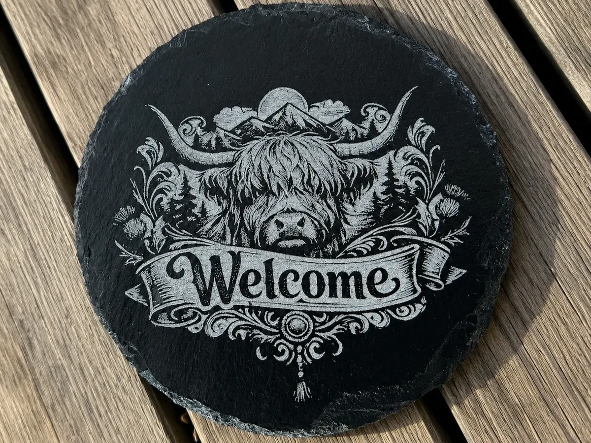 Round Slate Welcome Sign Featuring Highland Cow and Mountain Landscape ...